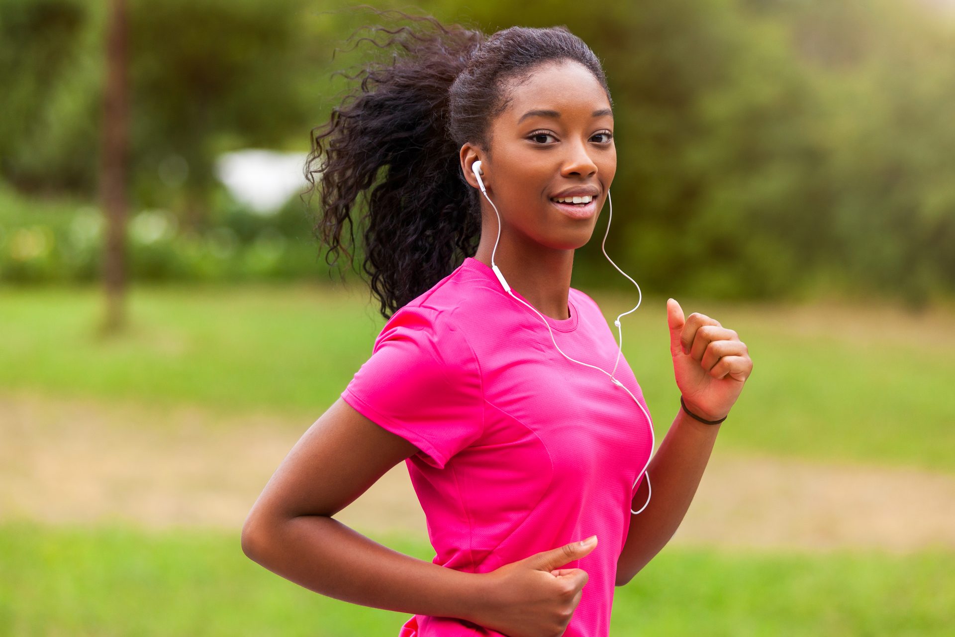 African American Woman Runner Jogging Outdoors - Fitness, People - TRIPP